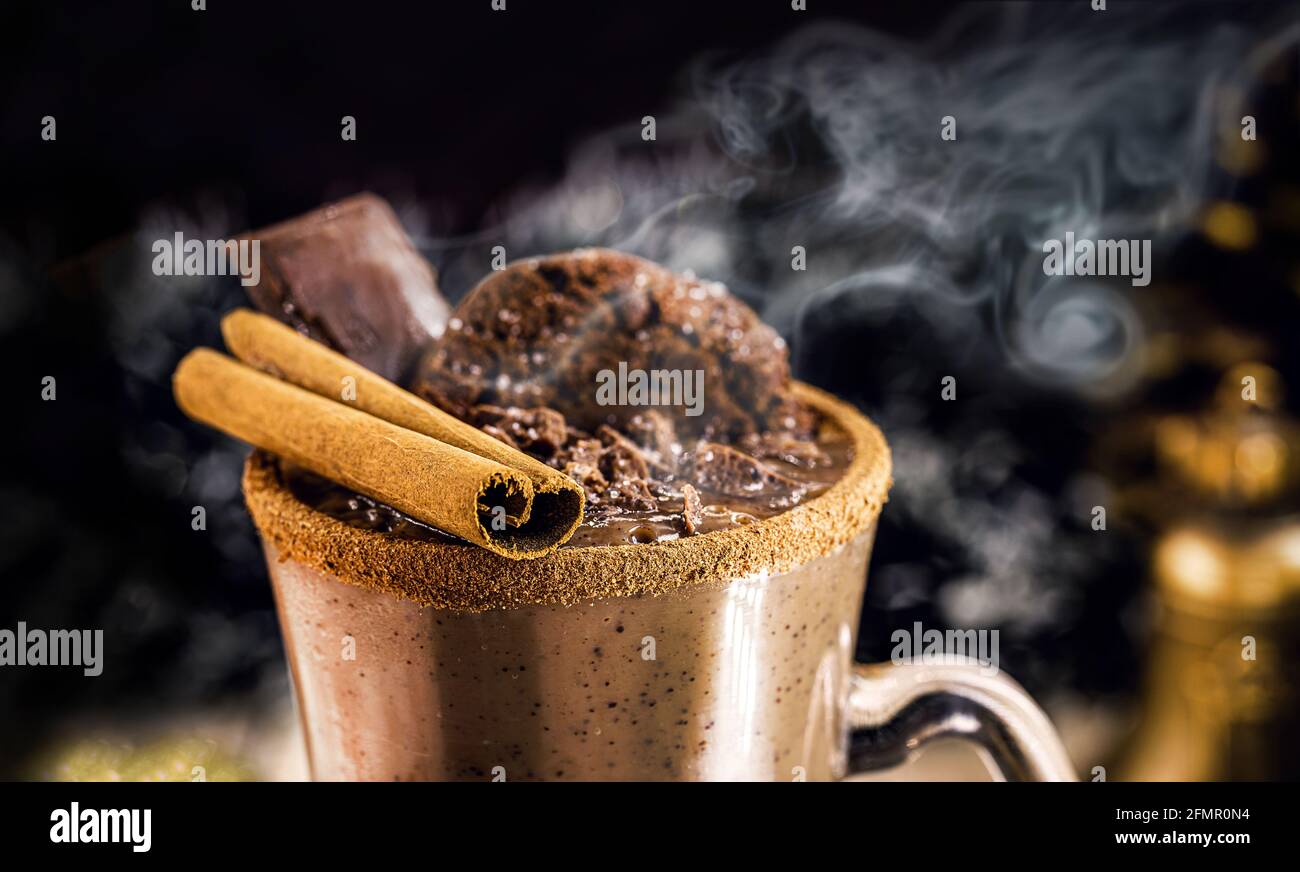 hot chocolate drink with smoke or high temperature steam, spot focus on ...