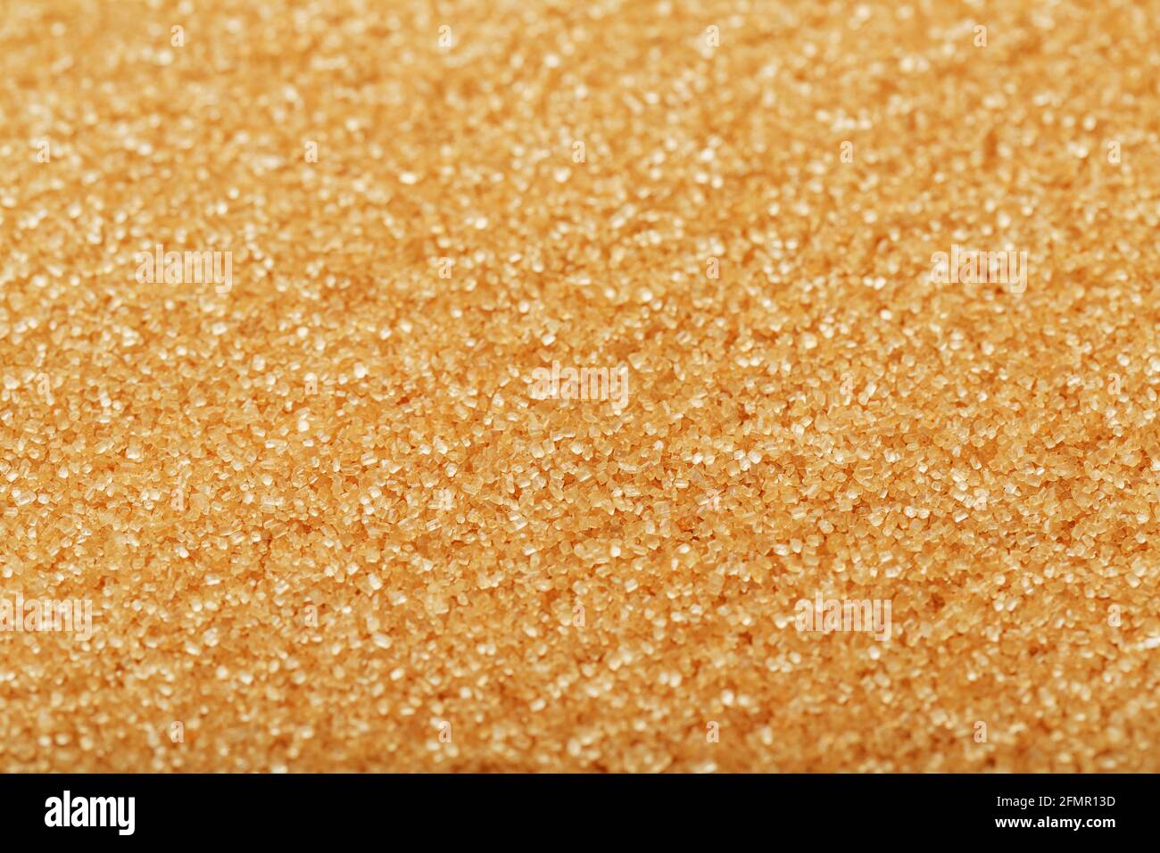 Texture of golden sand on the beach with a solid background in full ...