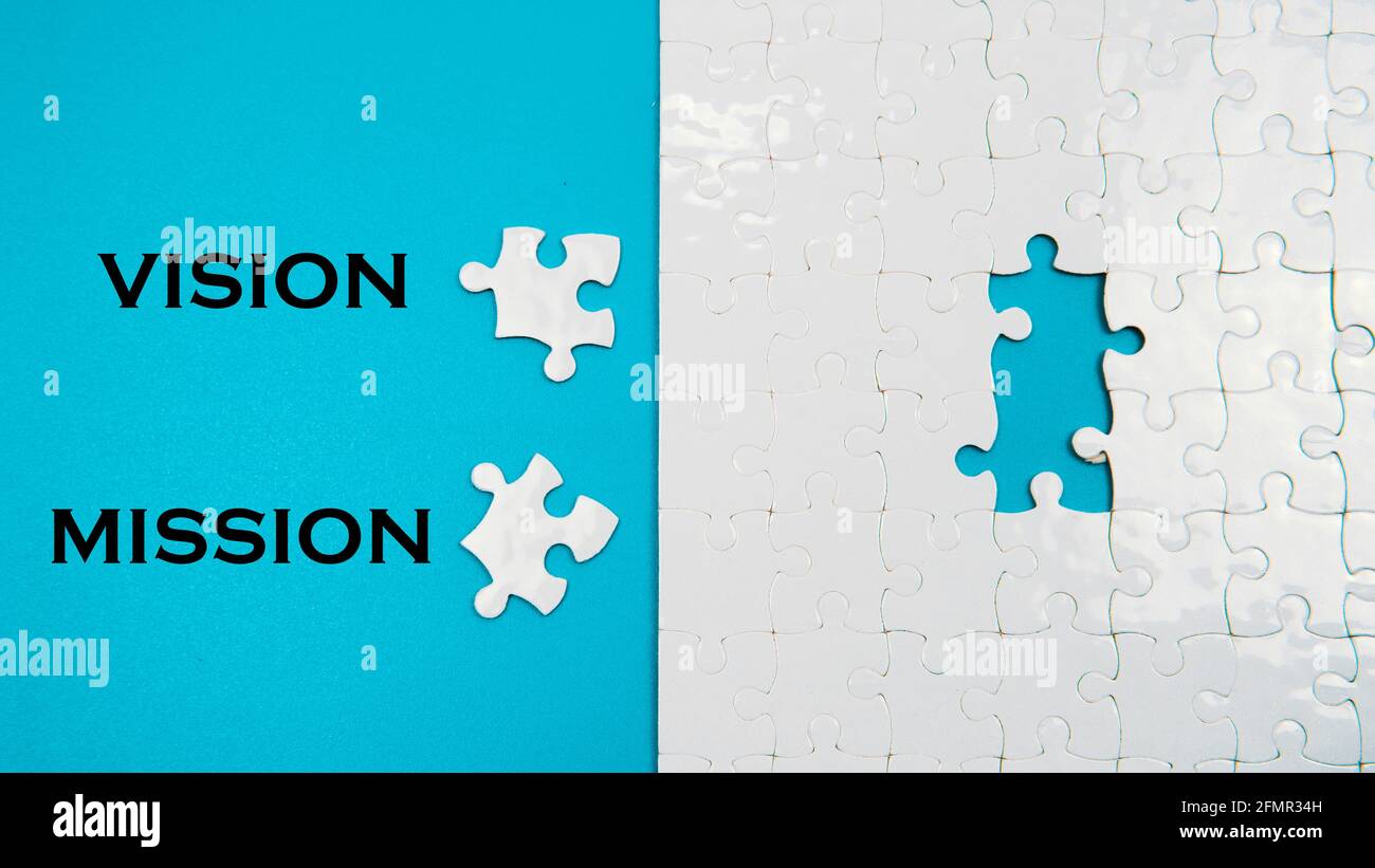 Selective focus management concept with a piece of jigsaw puzzle with ... Selective focus management concept with a piece of jigsaw puzzle with ...