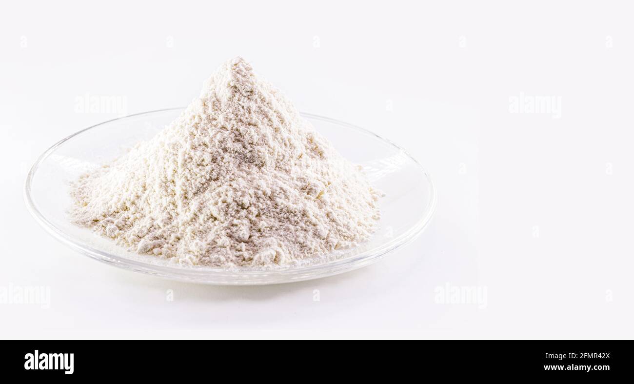 Pile of calcium sulfate on white background, known as micronized ...