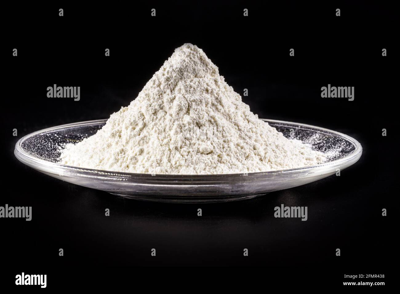 Pile of calcium sulfate on white background, known as micronized ...