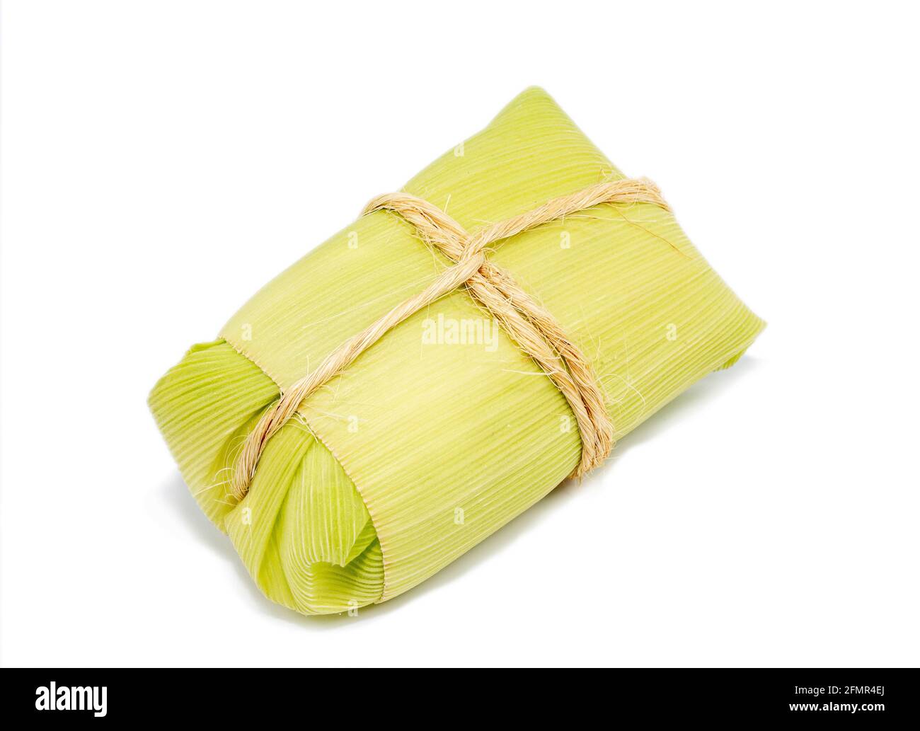 Brazilian pamonha on white background, typical dessert of the rural ...