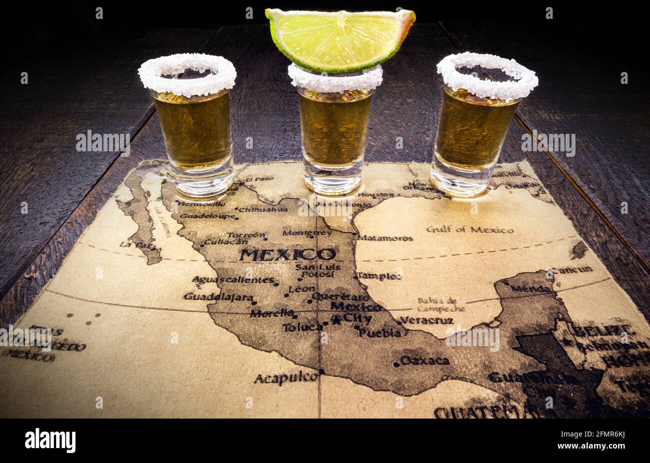 old mexico map with tequila glasses around, selective focus, image in ...