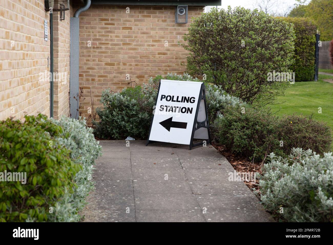 Polling station sign outside the entrance to a political voting ...