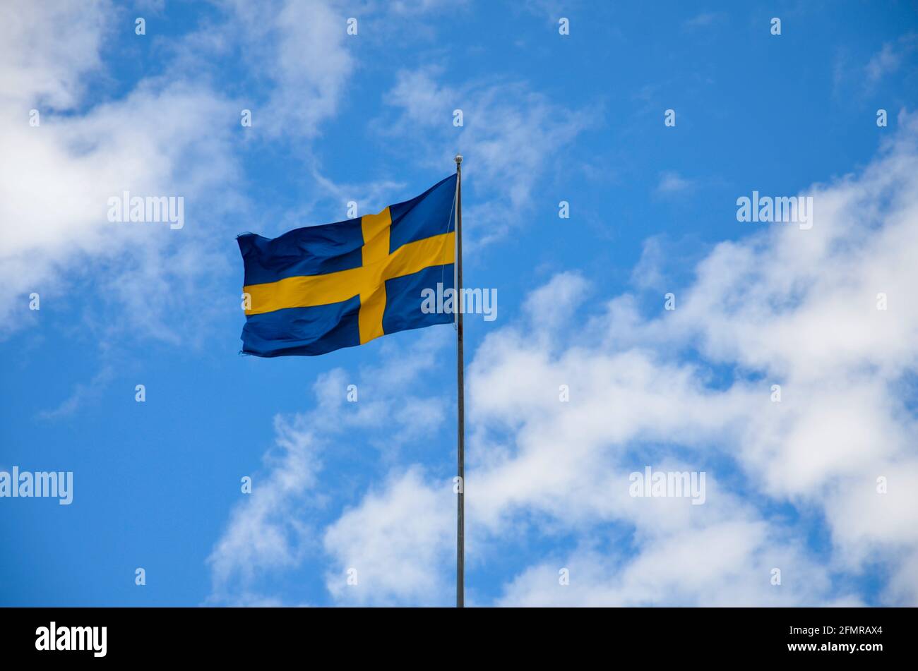 Stockholm, Sweden: The yellow blue Swedish national flag is flying in ...