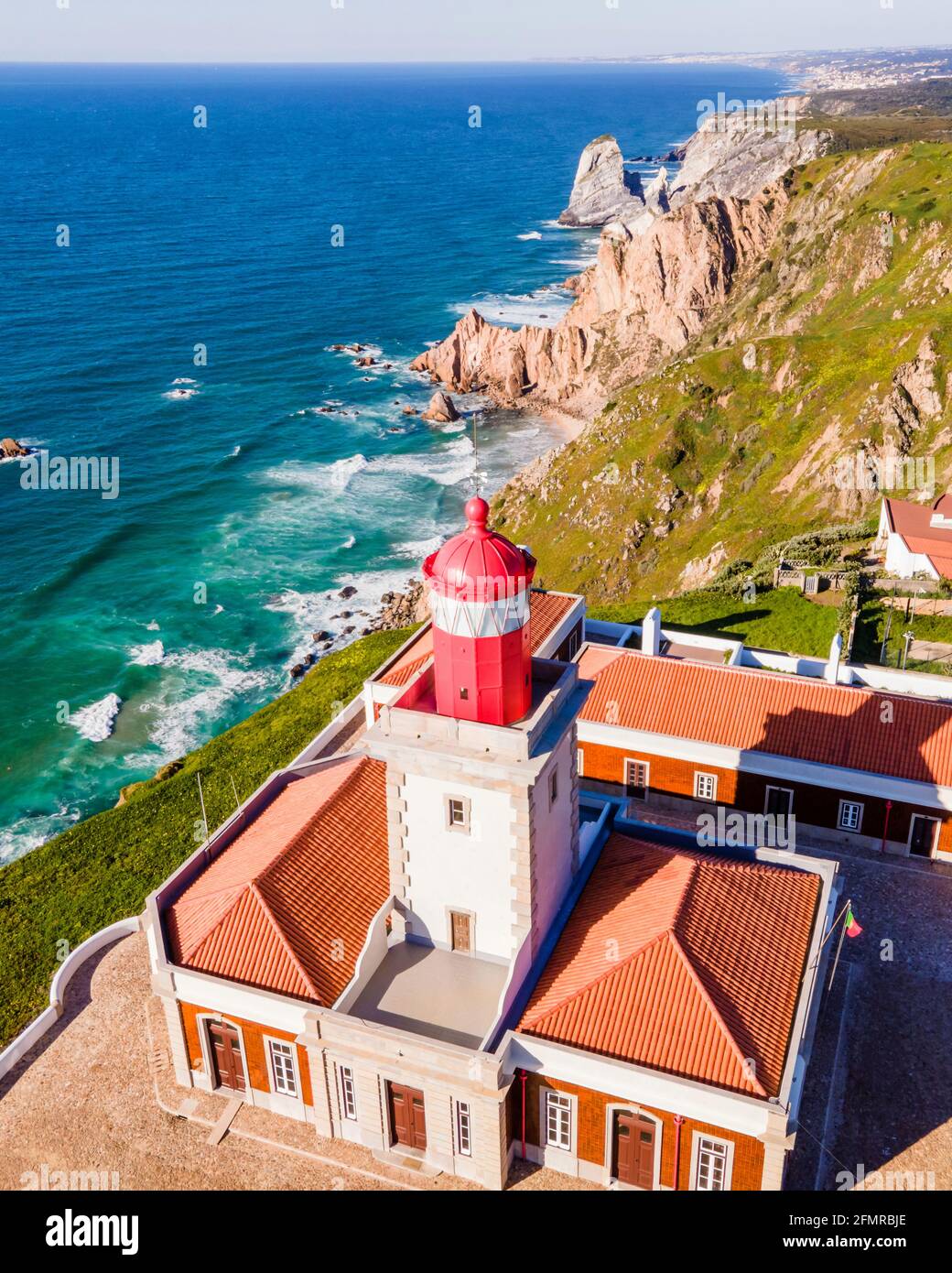 Aerial view of Cabo da Roca lighthouse, a natural coastline with a ...