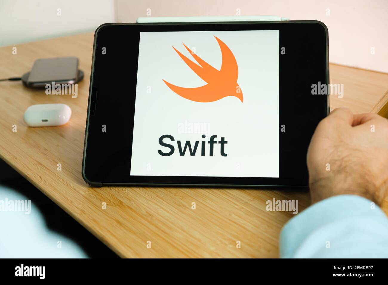 Apple Swift logo on the screen of iPad tablet. March 2021, San ...