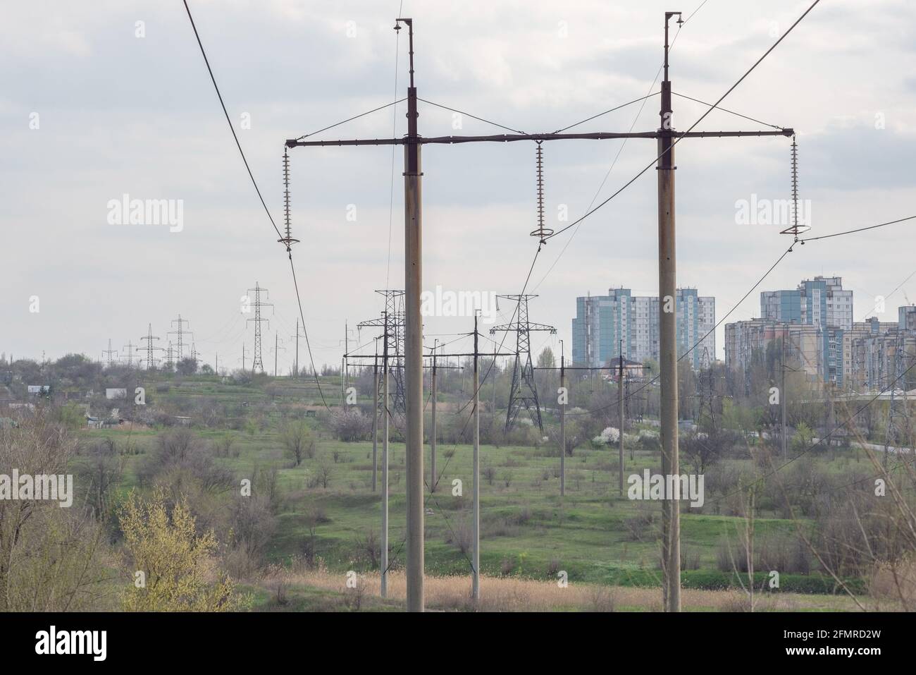 Electric pole and Power cable clutter high voltage poles with wires on ...