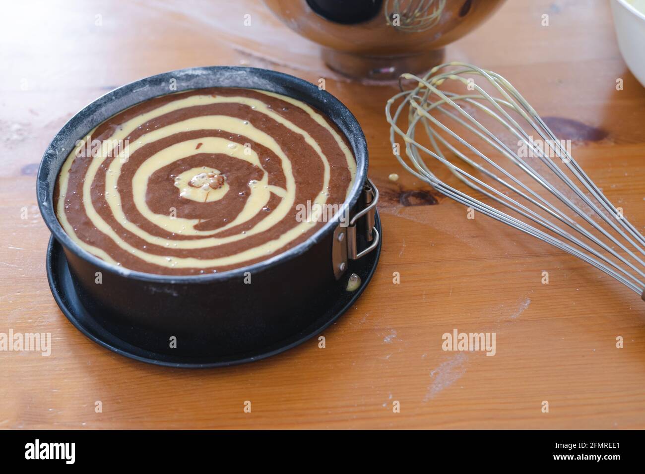 Marble sponge cake elaboration process. Copy space. Pastry Stock Photo ...