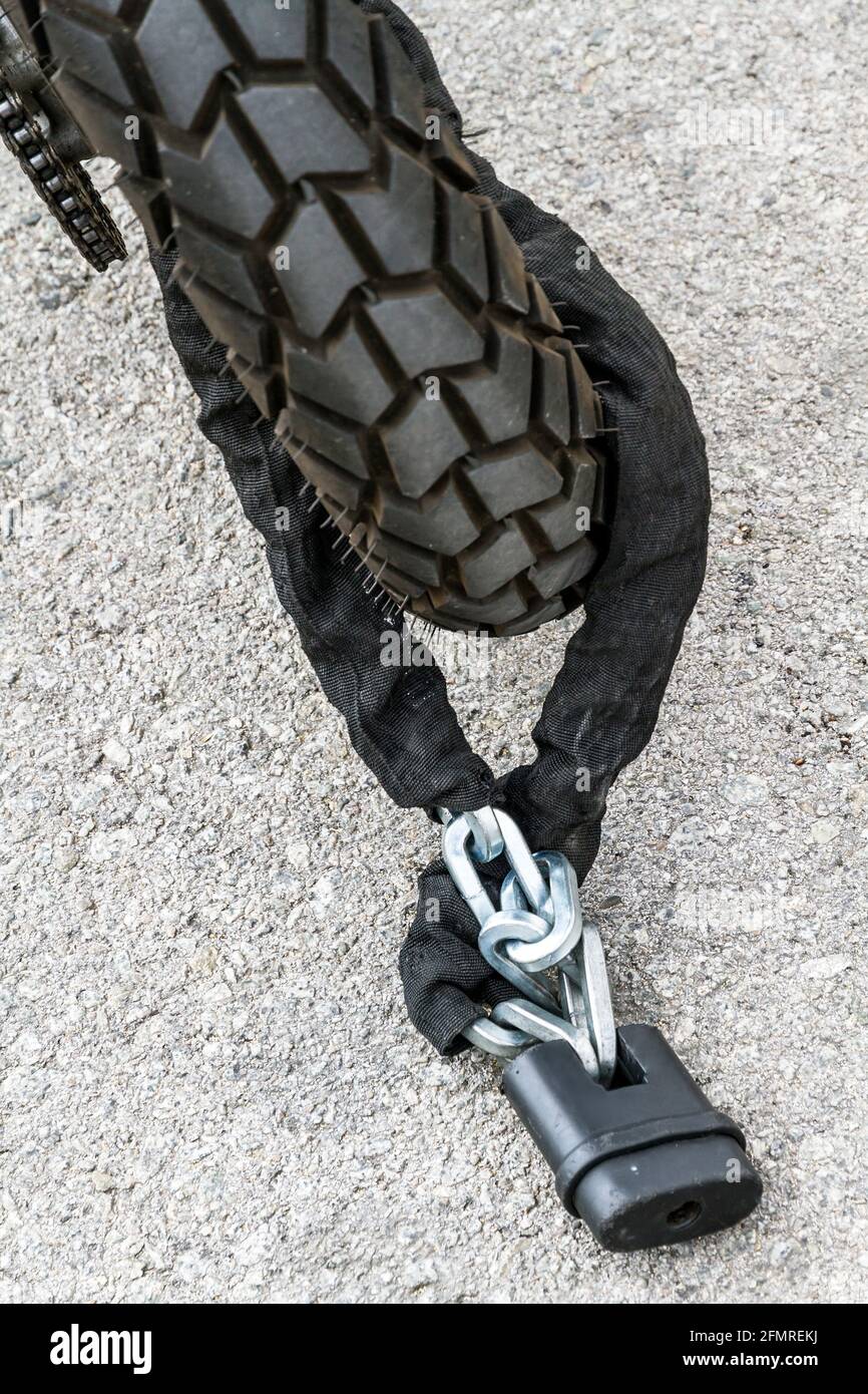 chain and padlock security wheel motorcycle, anti-theft system Stock ...