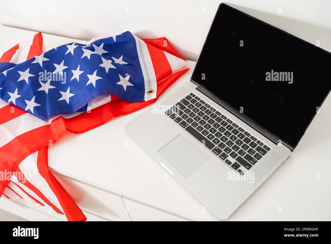 USA flag with a laptop computer, independence day online Stock Photo ...