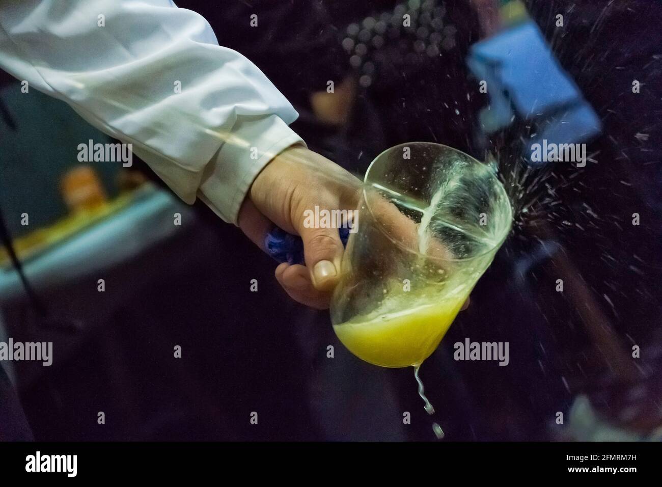 Pouring cider in a glass so typical of Asturias Spain to savor the ...