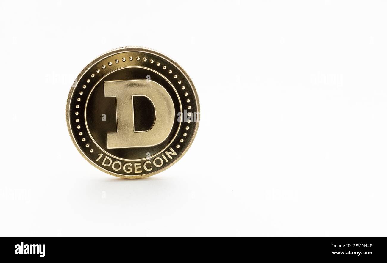 Dogecoin coin isolated on white background. Copy space Stock Photo - Alamy