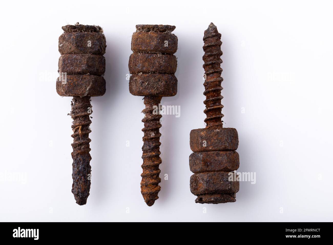 old rusty aged bolt, not usable, rusty item on white background Stock ...