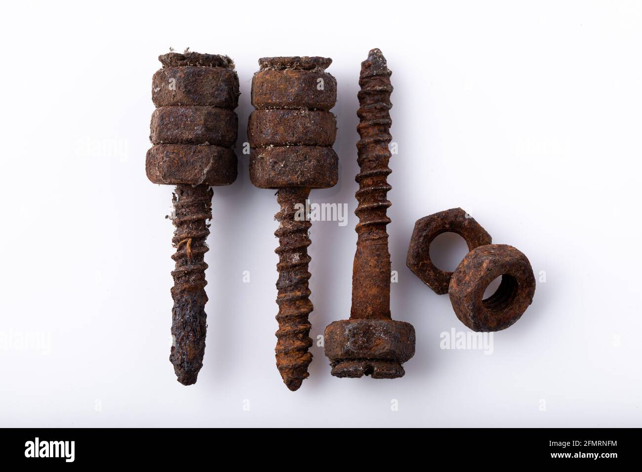 old rusty aged bolt, not usable, rusty item on white background Stock ...