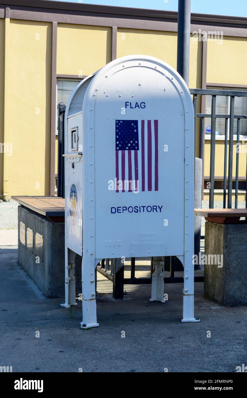 U.S. Flag depository sign on box used for that collects worn U.S. flags ...