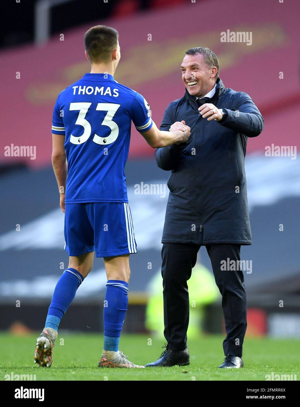 Leicester City's Luke Thomas (left) and manager Brendan Rodgers react ...