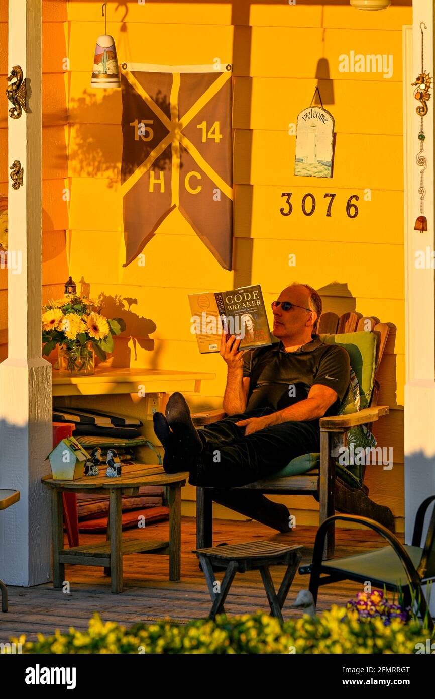 Man reading, The Code Breaker, book Stock Photo - Alamy