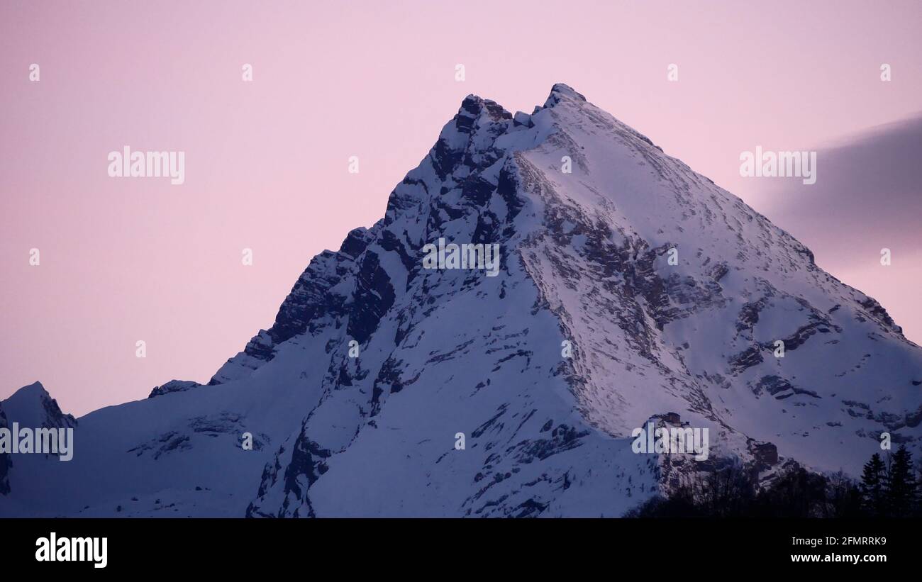 peak of Mt. Watzmann in winter after sunset, bavarian alps ...