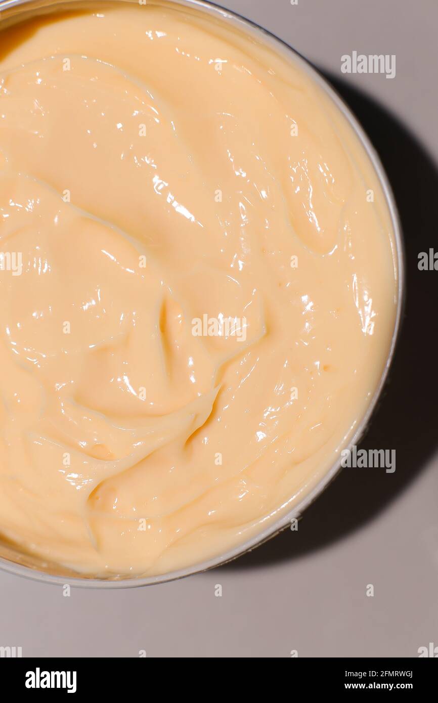 opened face cream container isolated on gray background Stock Photo - Alamy