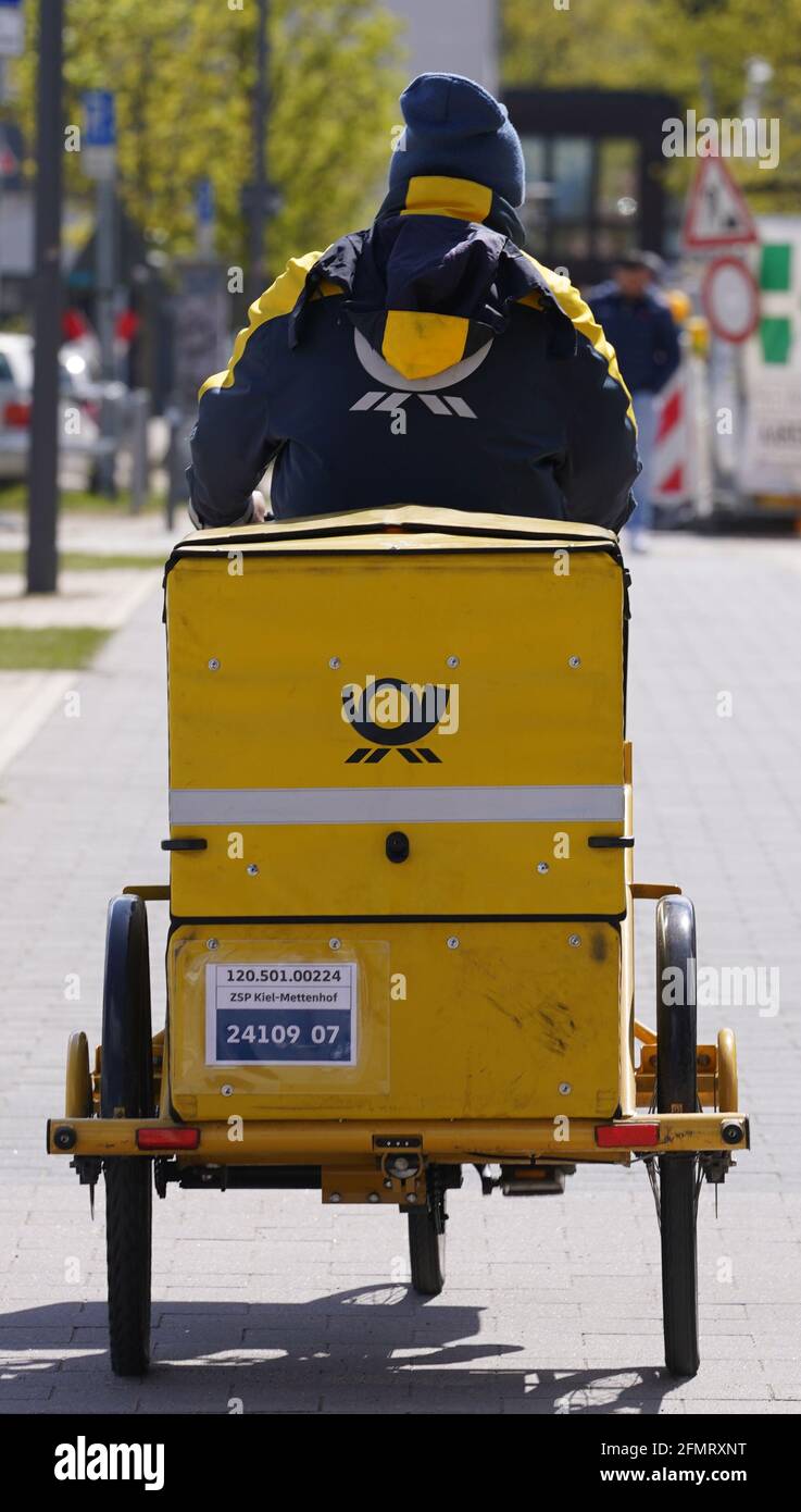 Postman rides hi-res stock photography and images - Alamy