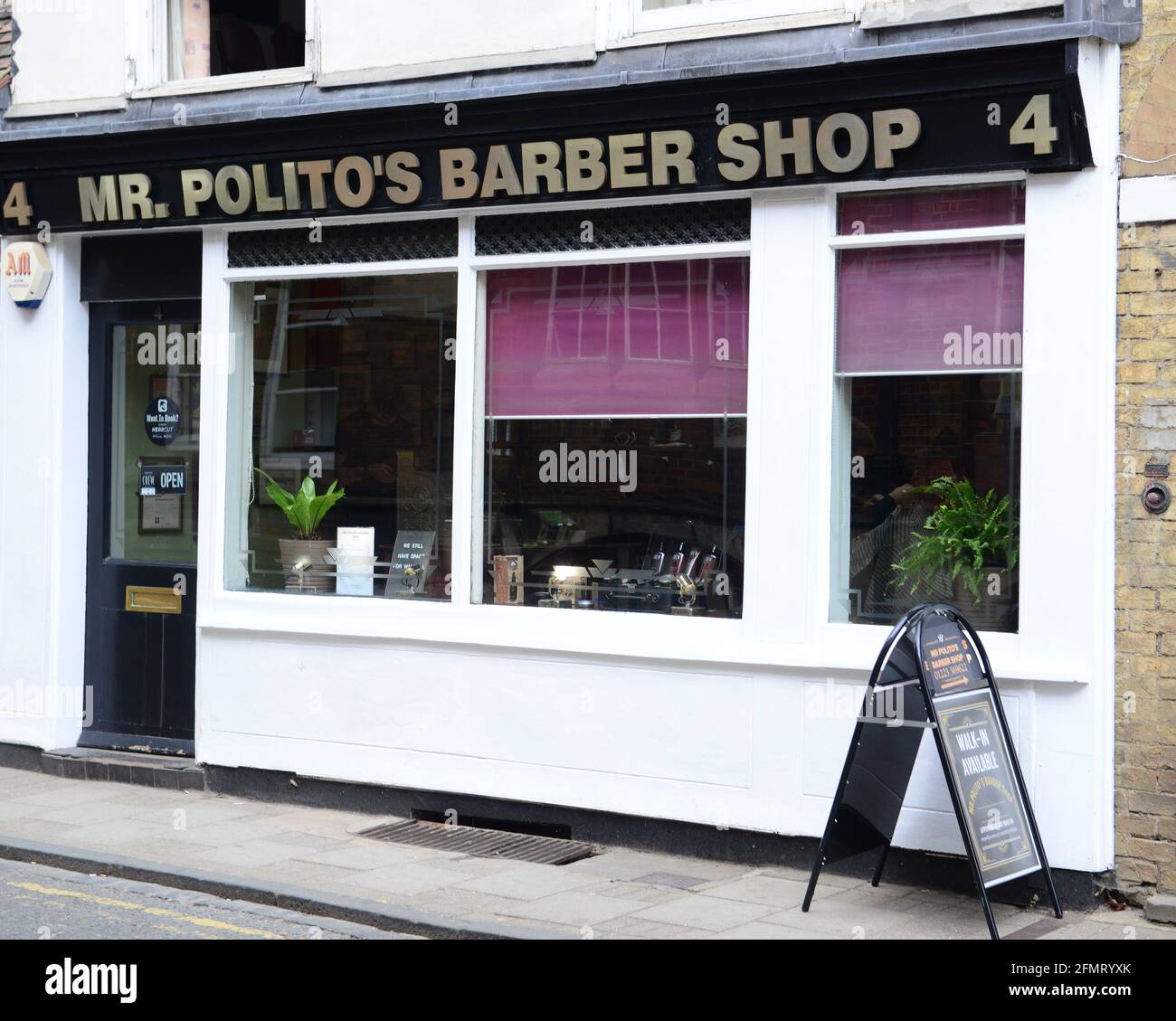 Exterior of barbers shop Stock Photo - Alamy