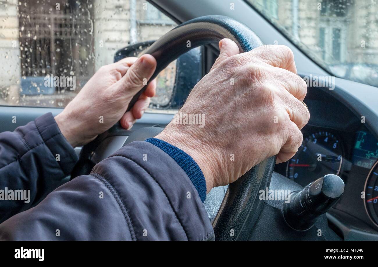 Man at steering wheel hi-res stock photography and images - Alamy