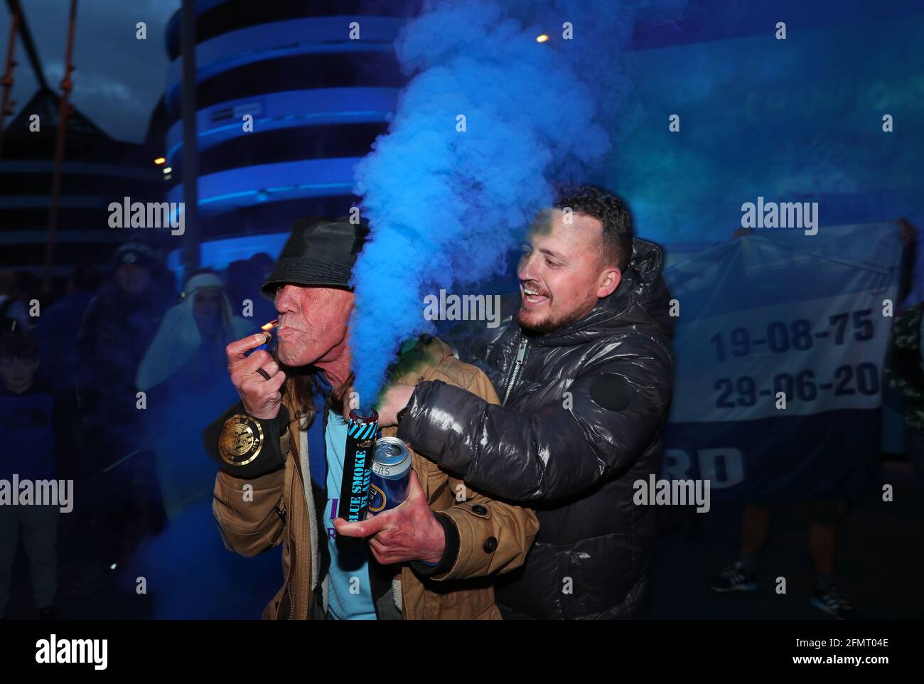 Manchester City fans celebrate at the Etihad Stadium, after Manchester ...