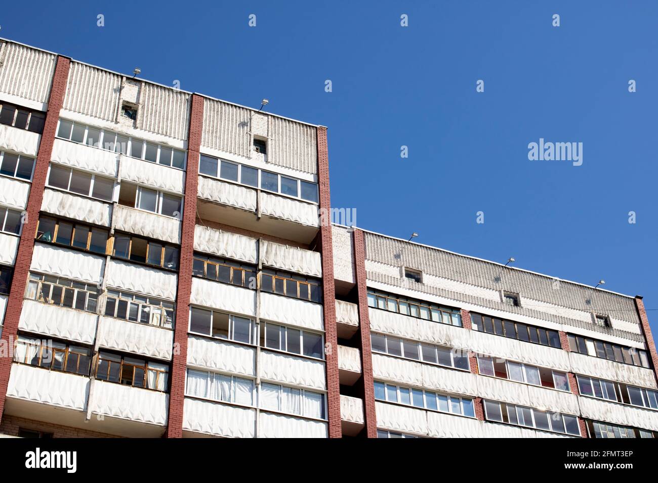 The sky and the upper floors of a tall house Stock Photo - Alamy