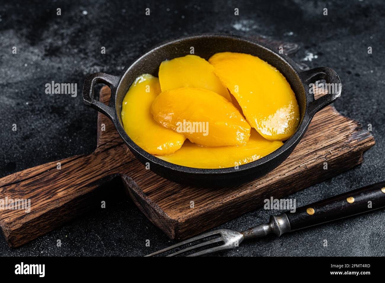 Mango slices tin can fruit hi-res stock photography and images - Alamy