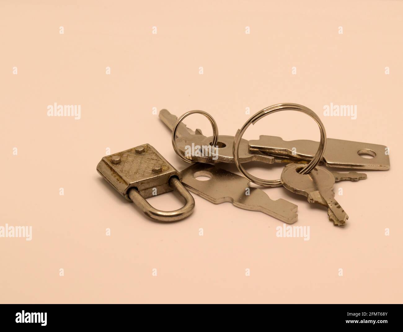 Background with varied keys and locks piled together Stock Photo - Alamy