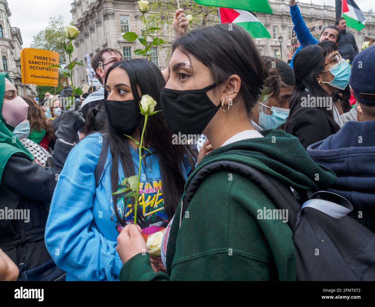 London, UK. 11th May 2021. Many carried white roses. Several thousand ...