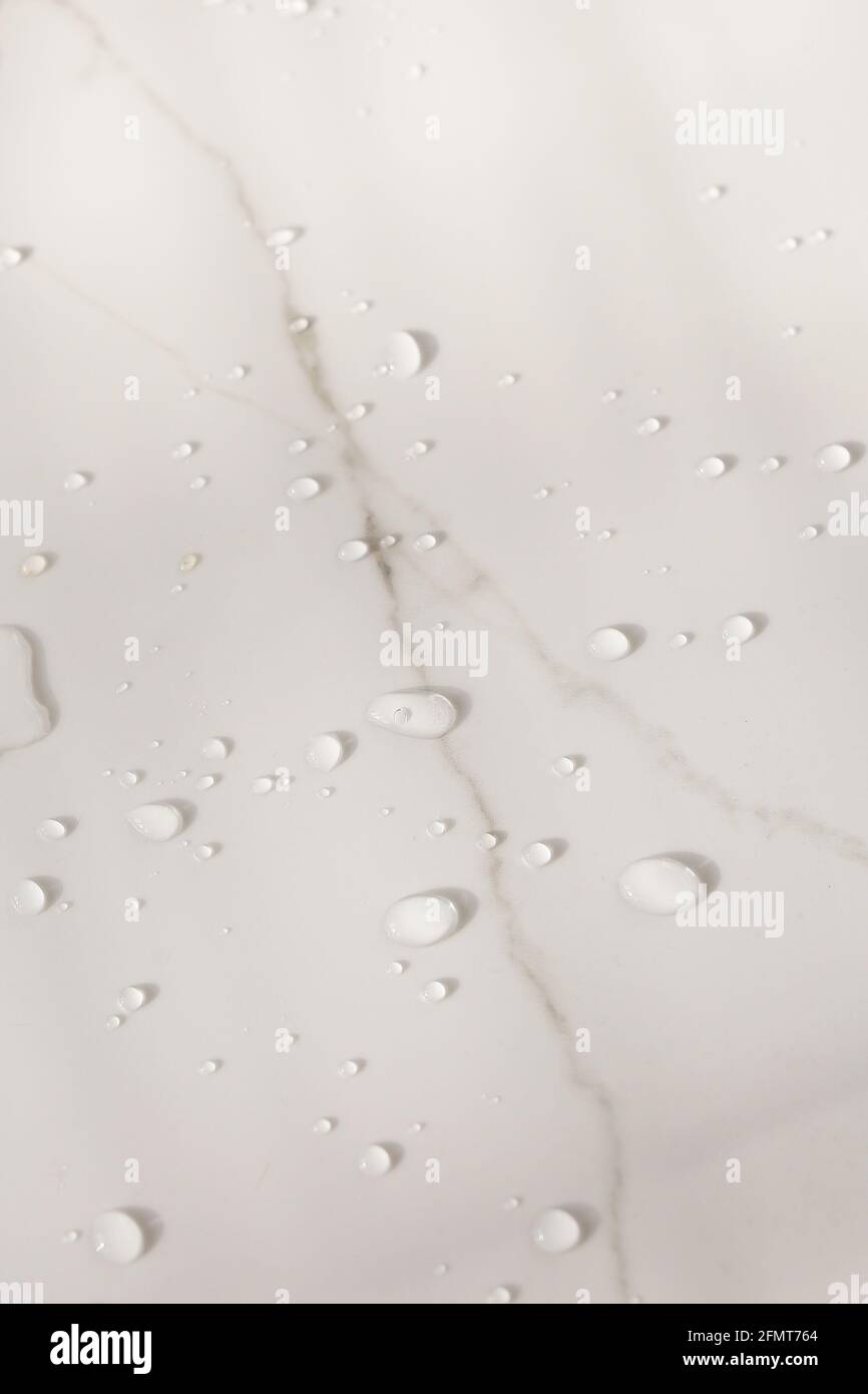 Water drops over marble stone texture background. Copy space ...