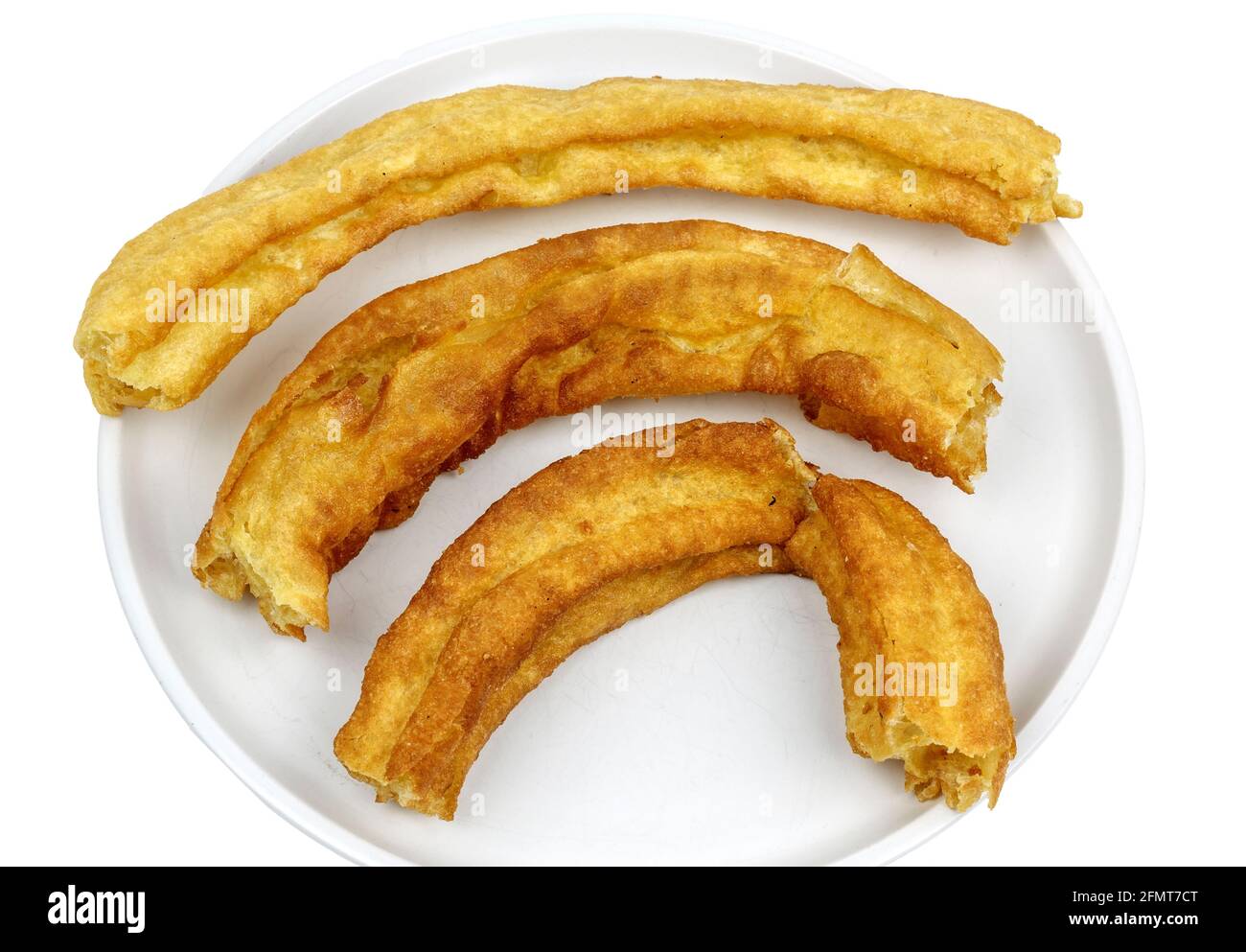 a pile of porras, thick churros typical of Spain Stock Photo - Alamy