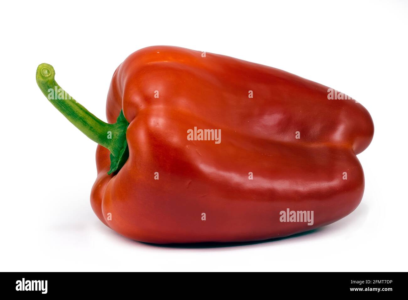 Bright red pepper isolated on white Stock Photo - Alamy