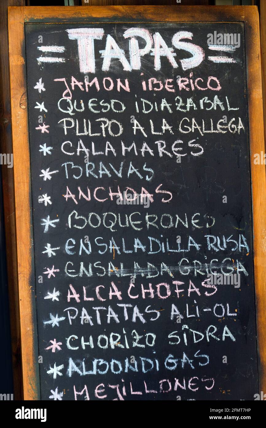 Board to record the range of Spanish tapas Stock Photo - Alamy