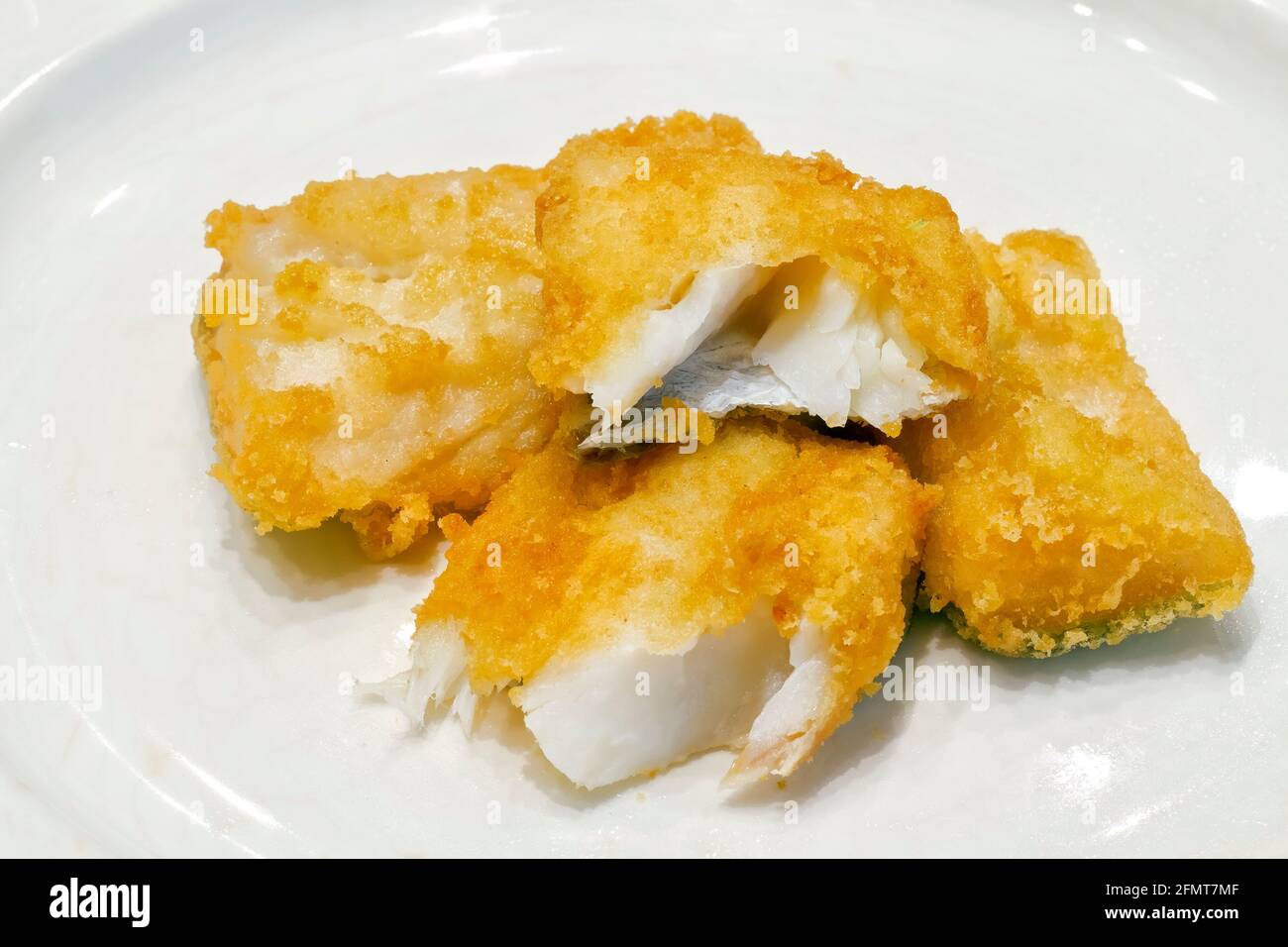 Fried salted codfish ready for a meal, Biscayan cod in Stock Photo - Alamy