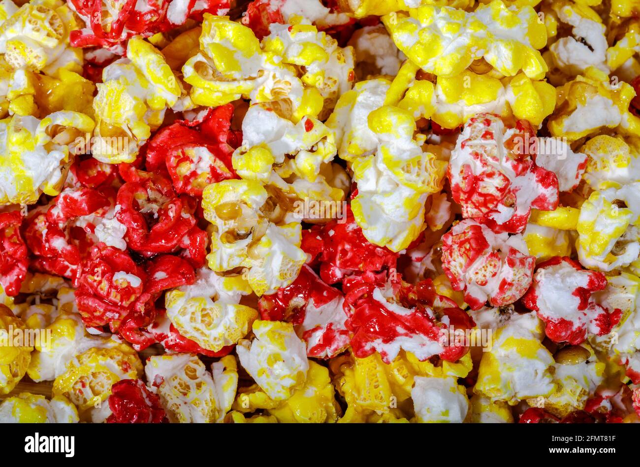 Texture background of sugary popcorn of various colors Stock Photo - Alamy