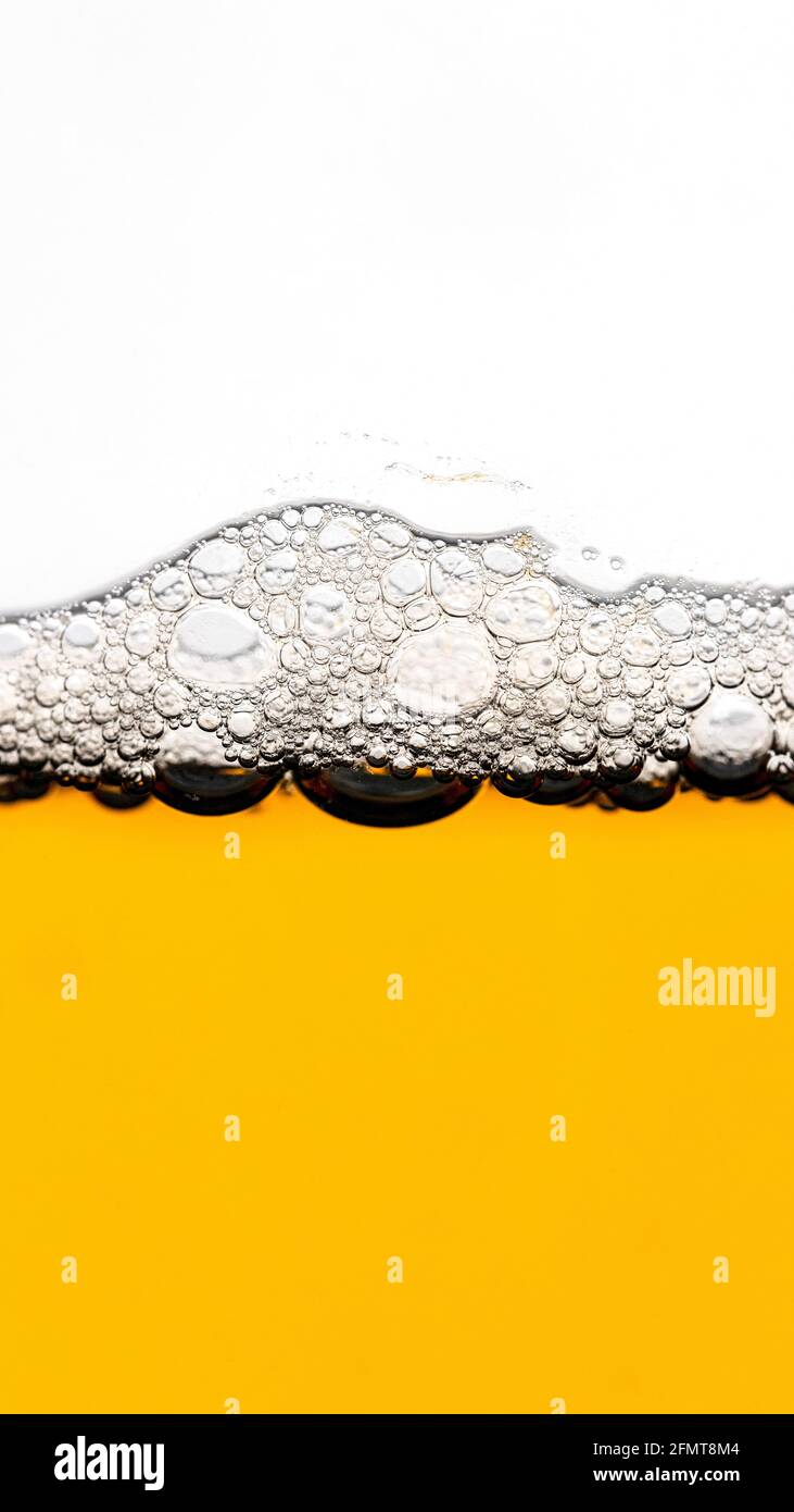 Closeup of beer with foam wallpaper Stock Photo - Alamy