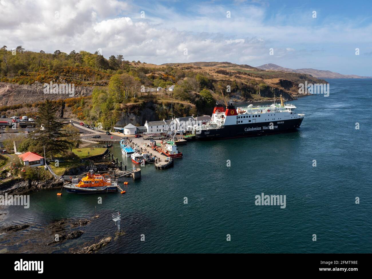 The Caledonian Macbrayne ferry MV Finlaggan departs Port Askaig Isle of ...