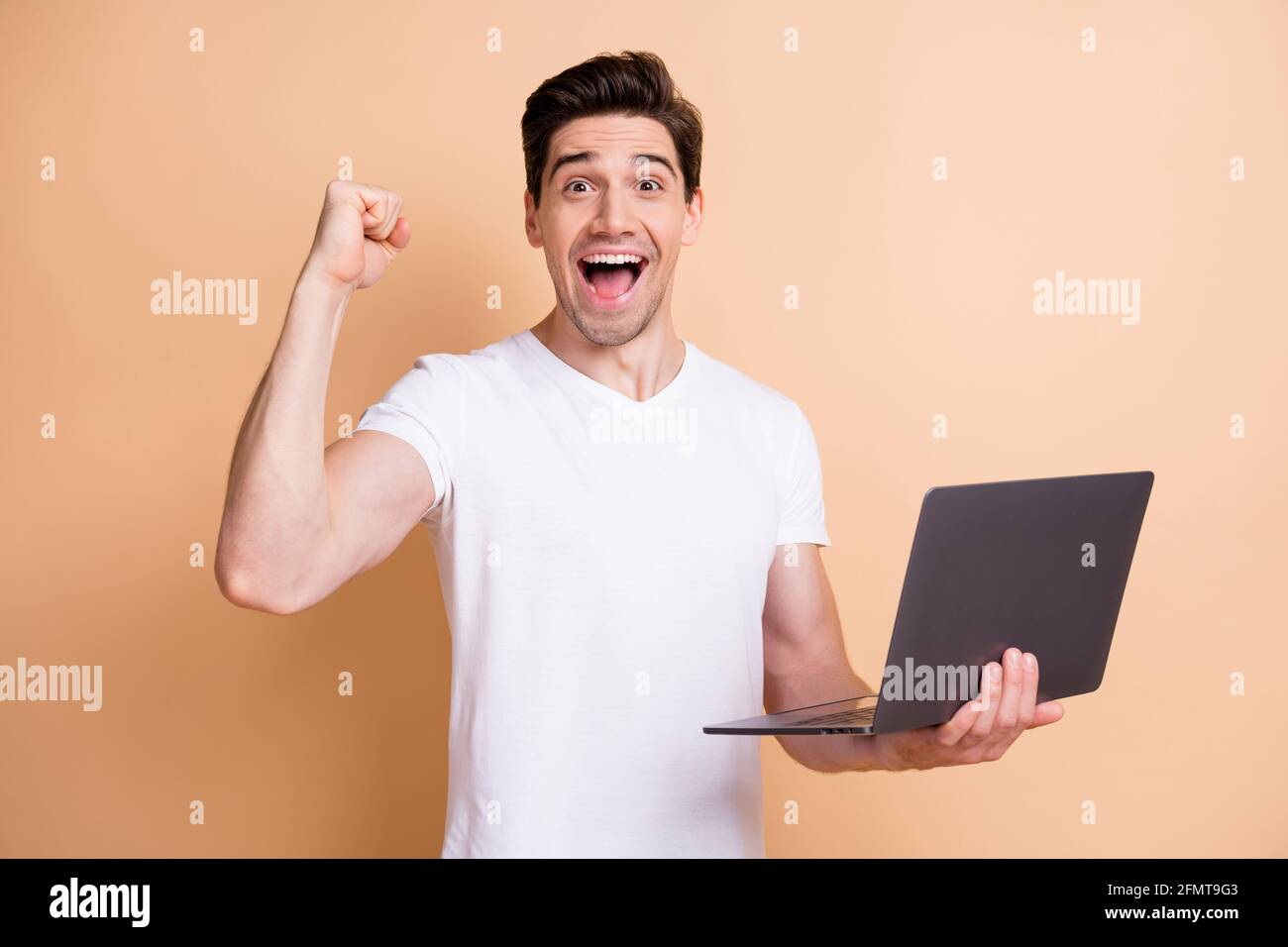 Portrait of positive astonished person fist up open mouth shout yes ...