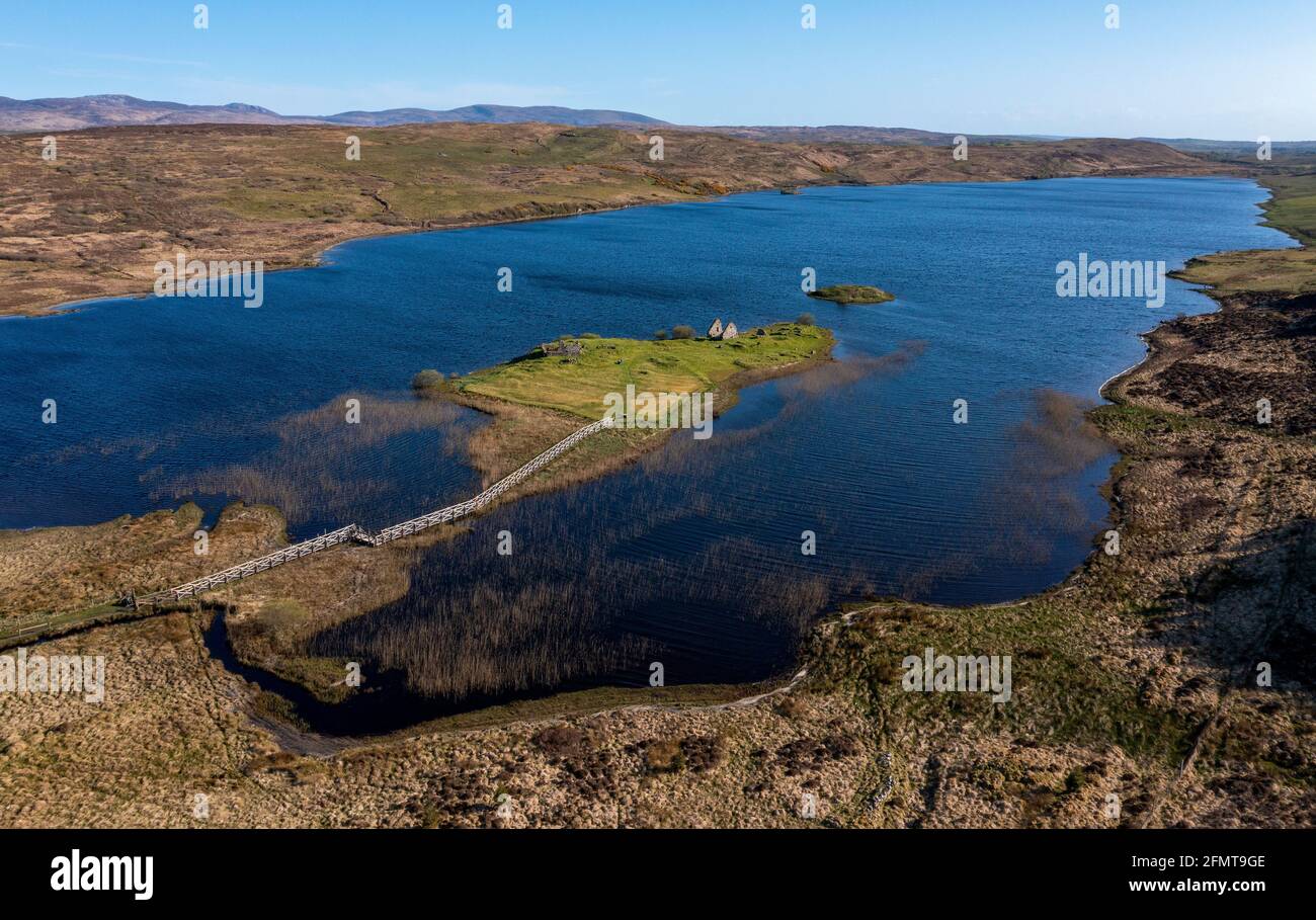 Aerial view of Finlaggan historic site on Eilean Mòr in Loch Finlaggan ...