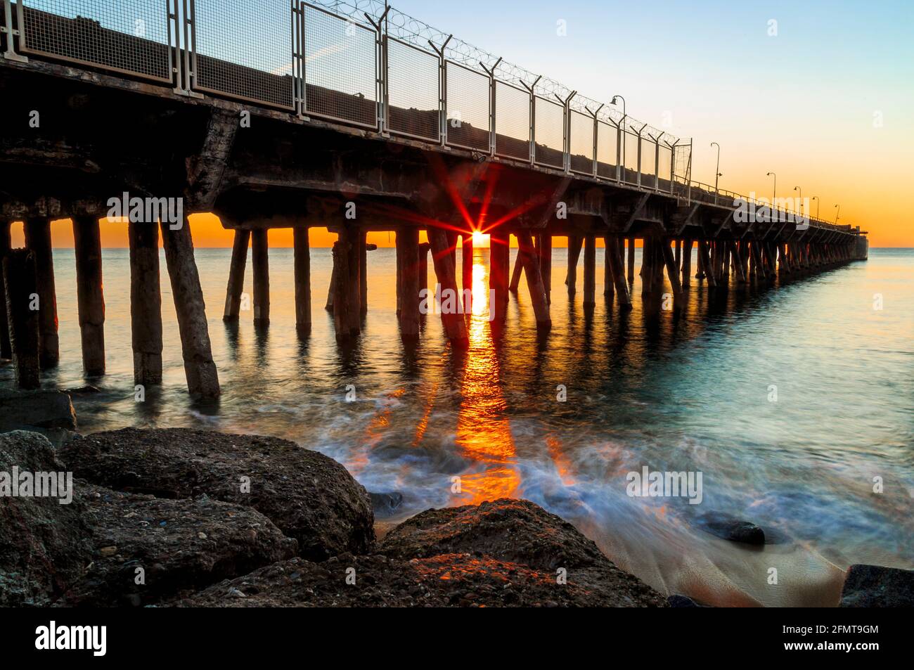 Pont Thermal Badalona, sunrise with the sun between columns Stock Photo ...