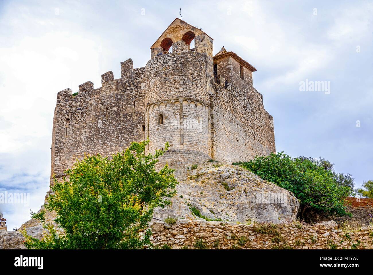 Medieval stone castle of Catalonia on the rock in Spain. Main landmark ...