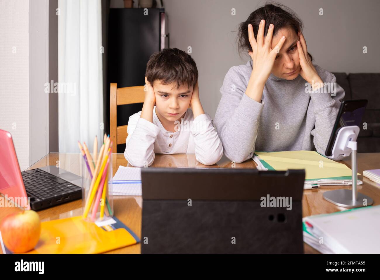 boy doing his homework while lock down, studying remotely Stock Photo ...