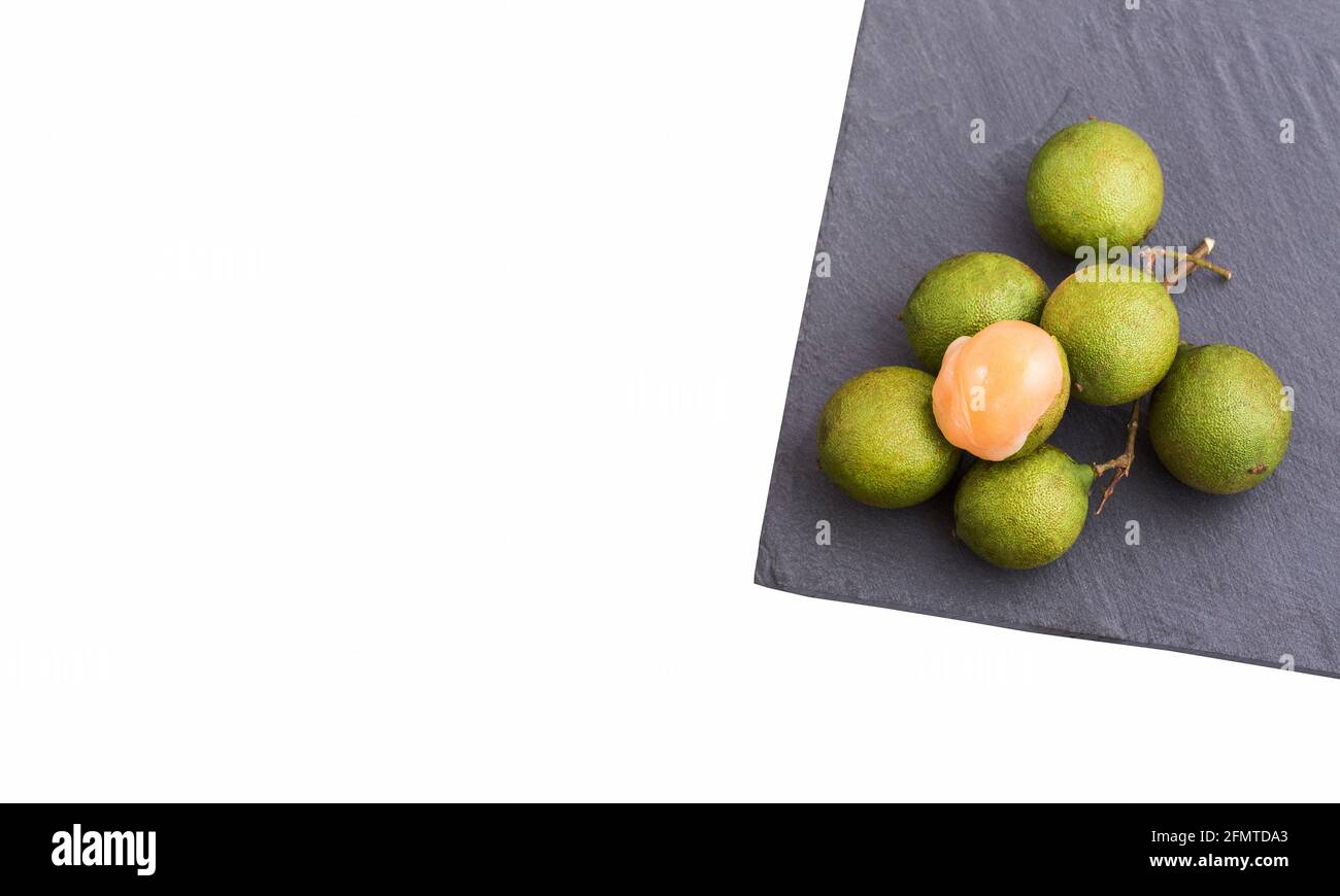 Melicoccus bijugatus - Fresh ripe peeled quenepa fruit Stock Photo - Alamy