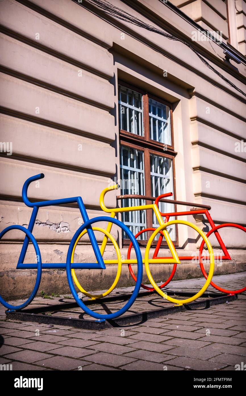 Colorful bicycle rack on the pavement Stock Photo - Alamy