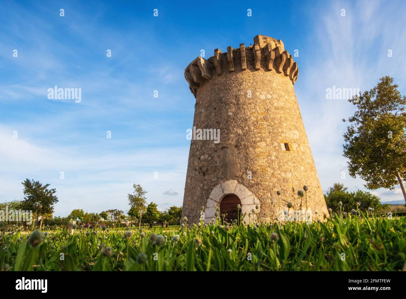 Torre de Piles on the Piles Beach under the sunlight and a blue cloudy ...