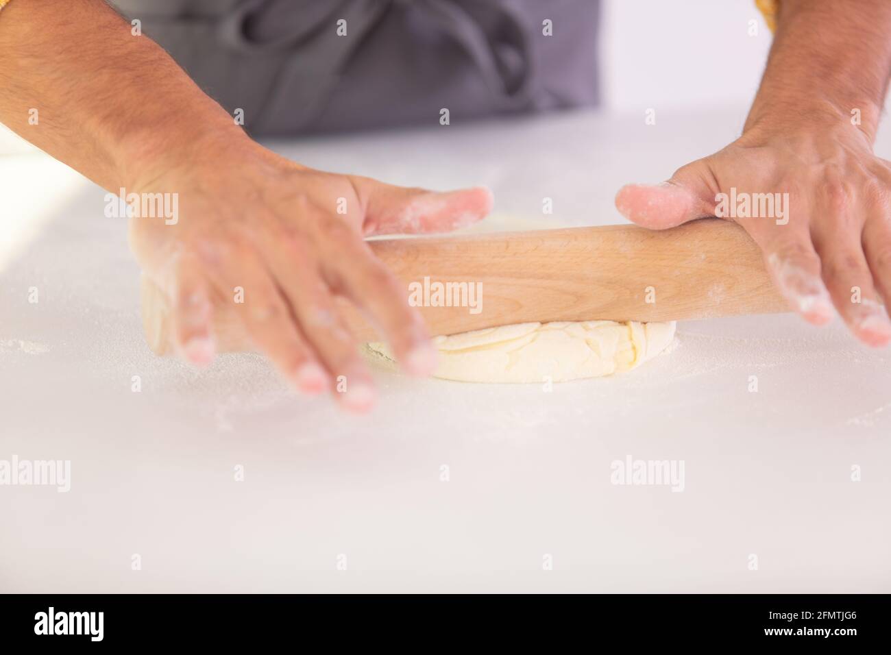 closeup man hands kneading dough Stock Photo - Alamy