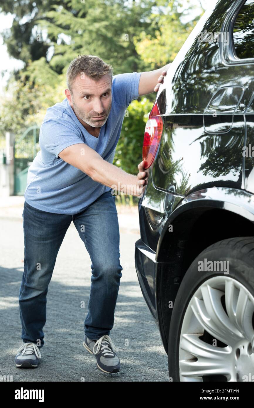 Pushing car broken down hi-res stock photography and images - Alamy